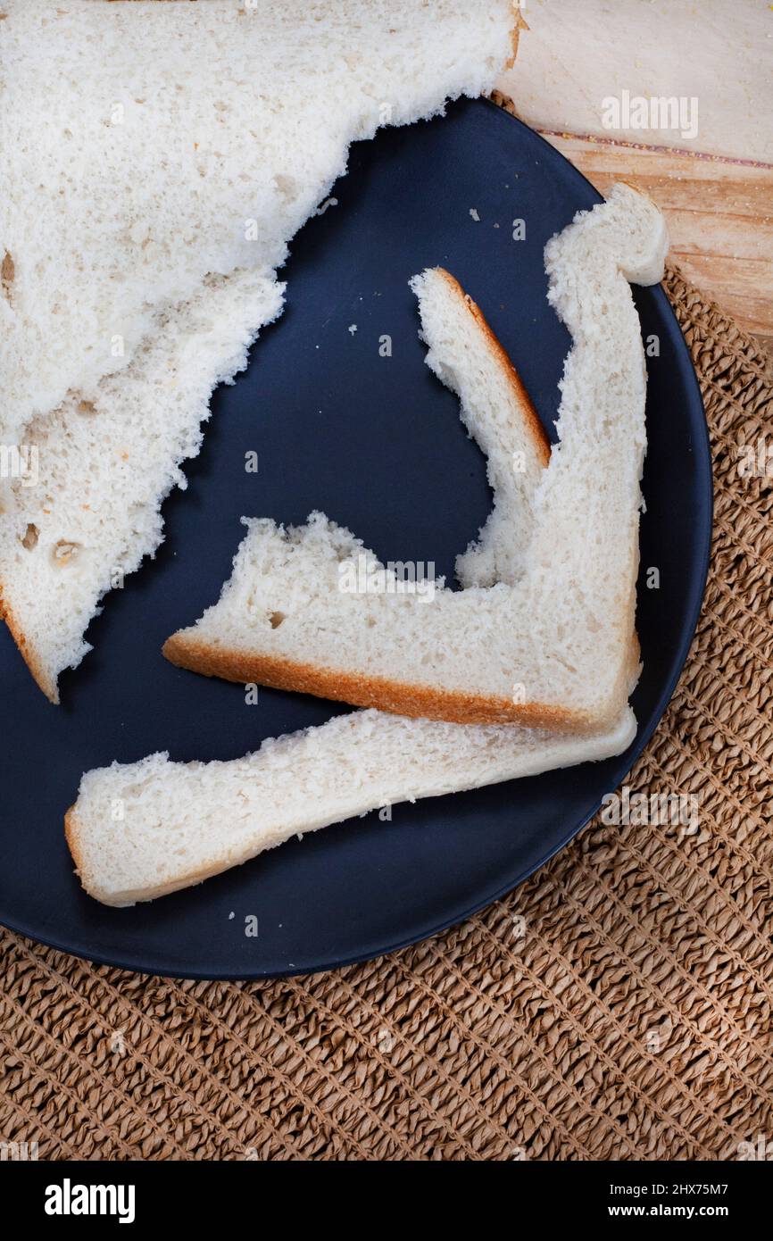 Crusts and crumbs of white bread slices as food security and shortages ...