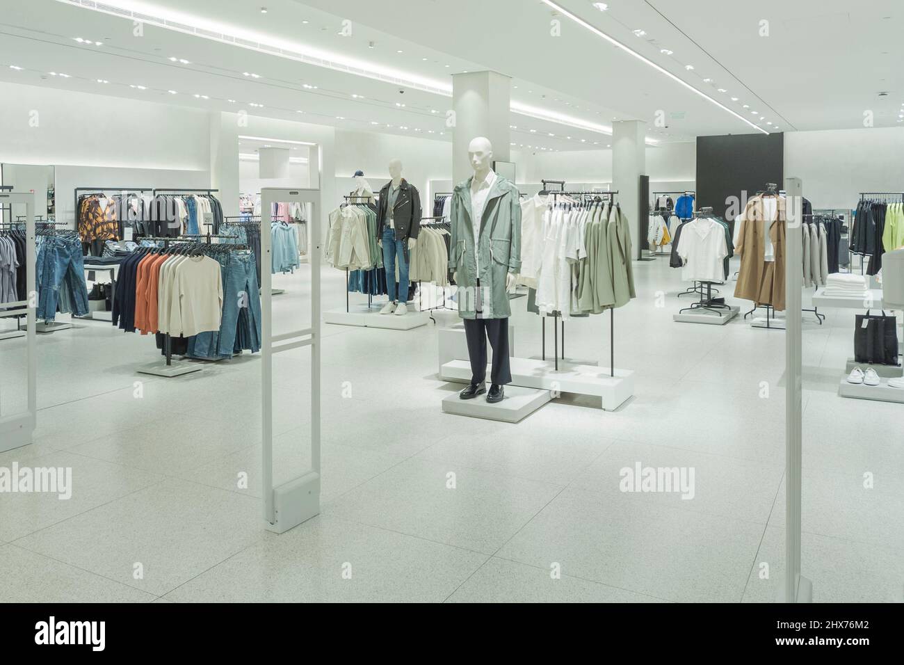 Modern fashionable brand interior of empty clothing store inside ...