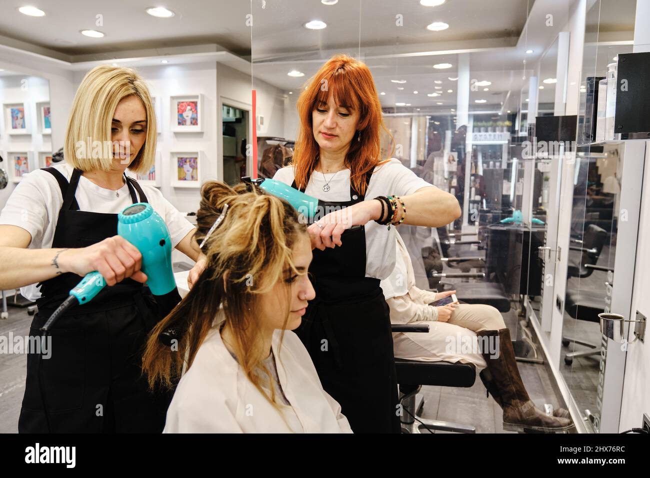 Hairdresser preparing young woman hi-res stock photography and images ...