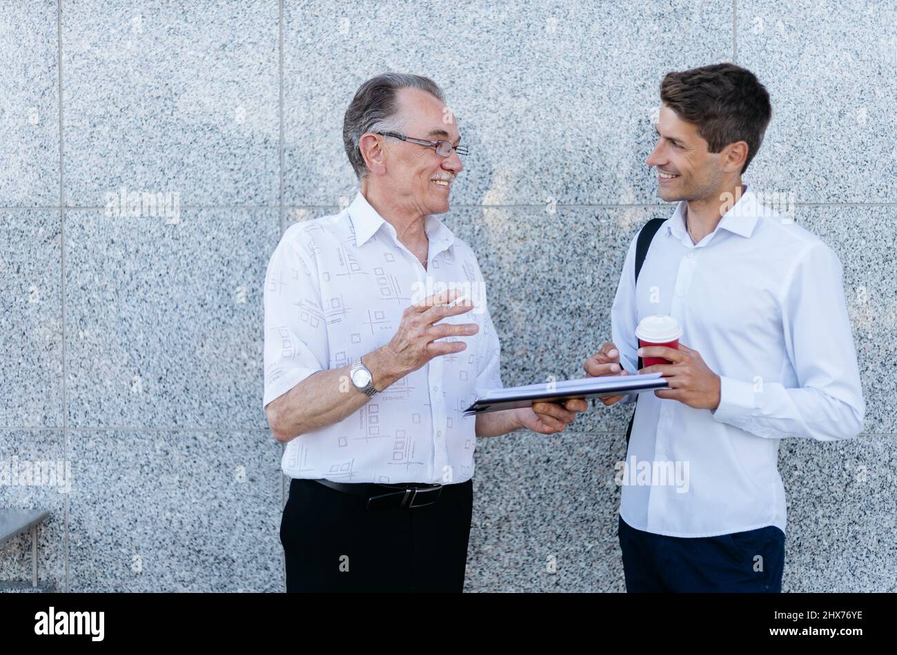 business colleagues talk during a coffee break Stock Photo - Alamy