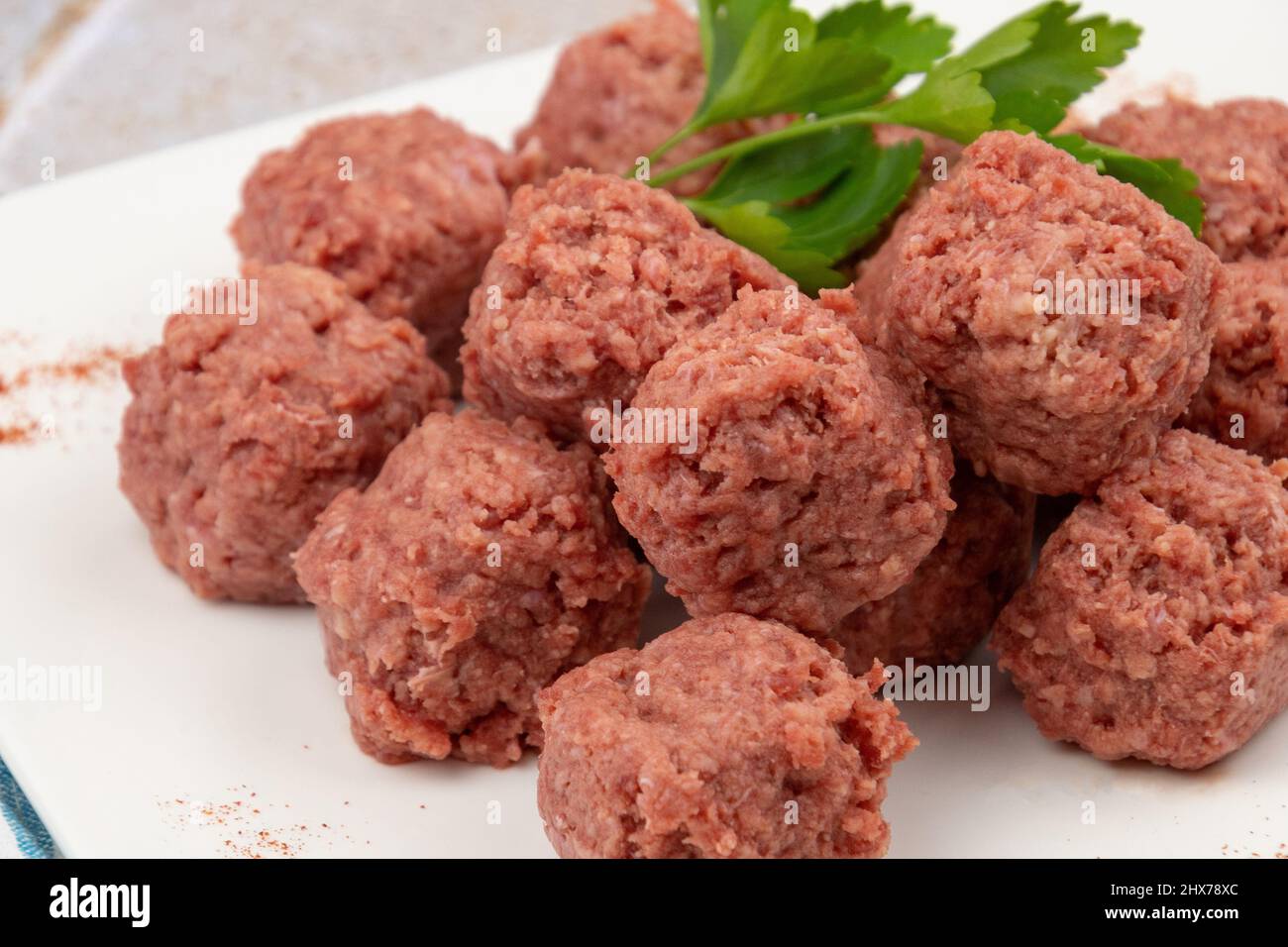 close up of raw beef dumpling on white plate Stock Photo - Alamy