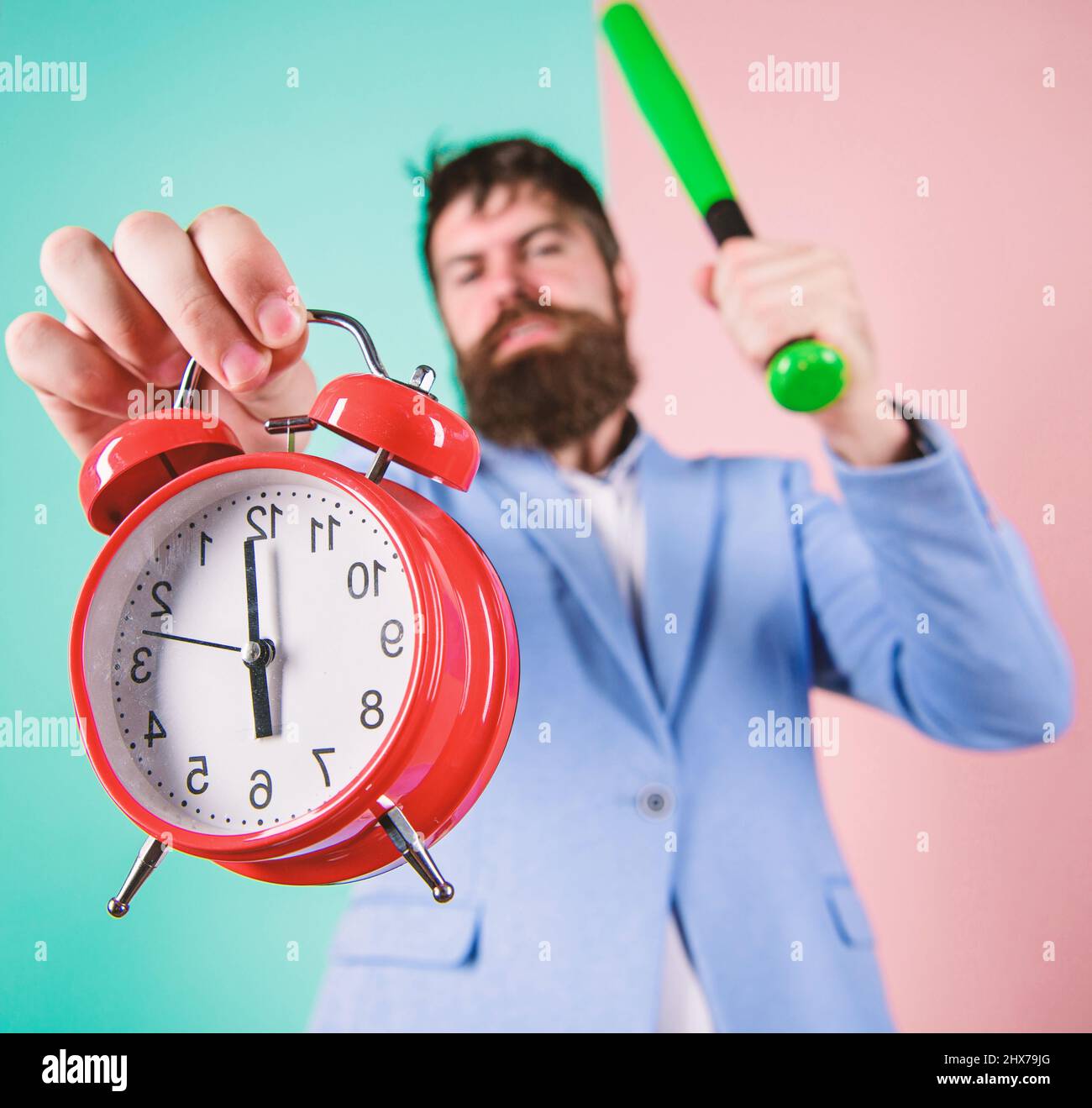 Discipline and sanctions. Boss aggressive face hold alarm clock ...