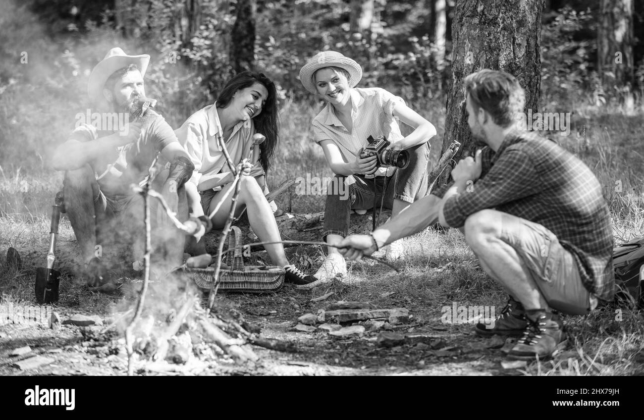 Hikers sharing impression of walk and eating. Weekend hike. Picnic with ...