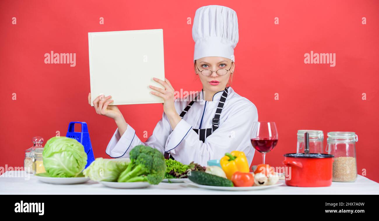 Female in hat and apron knows everything about culinary arts ...