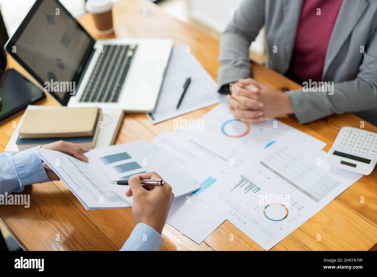 Business negotiation concept the male chattel dealer showing his ...