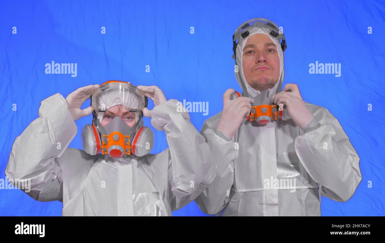 Doctor health worker in respirator. Slow motion. People portrait ...