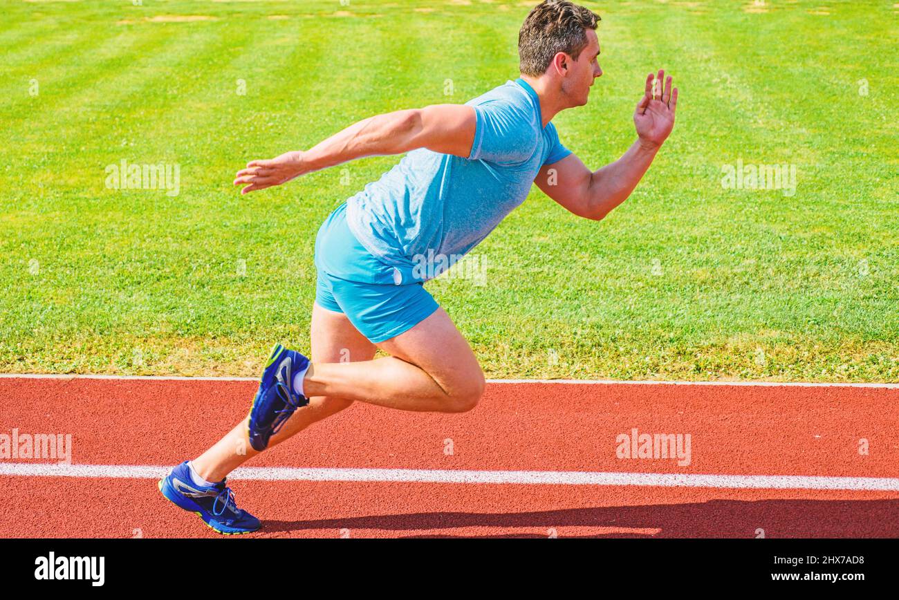 Runner captured in motion just after start of race. Runner sprint race ...