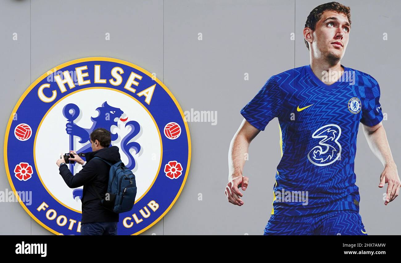A fan takes a photo in outside of Stamford Bridge, home of Chelsea FC ...
