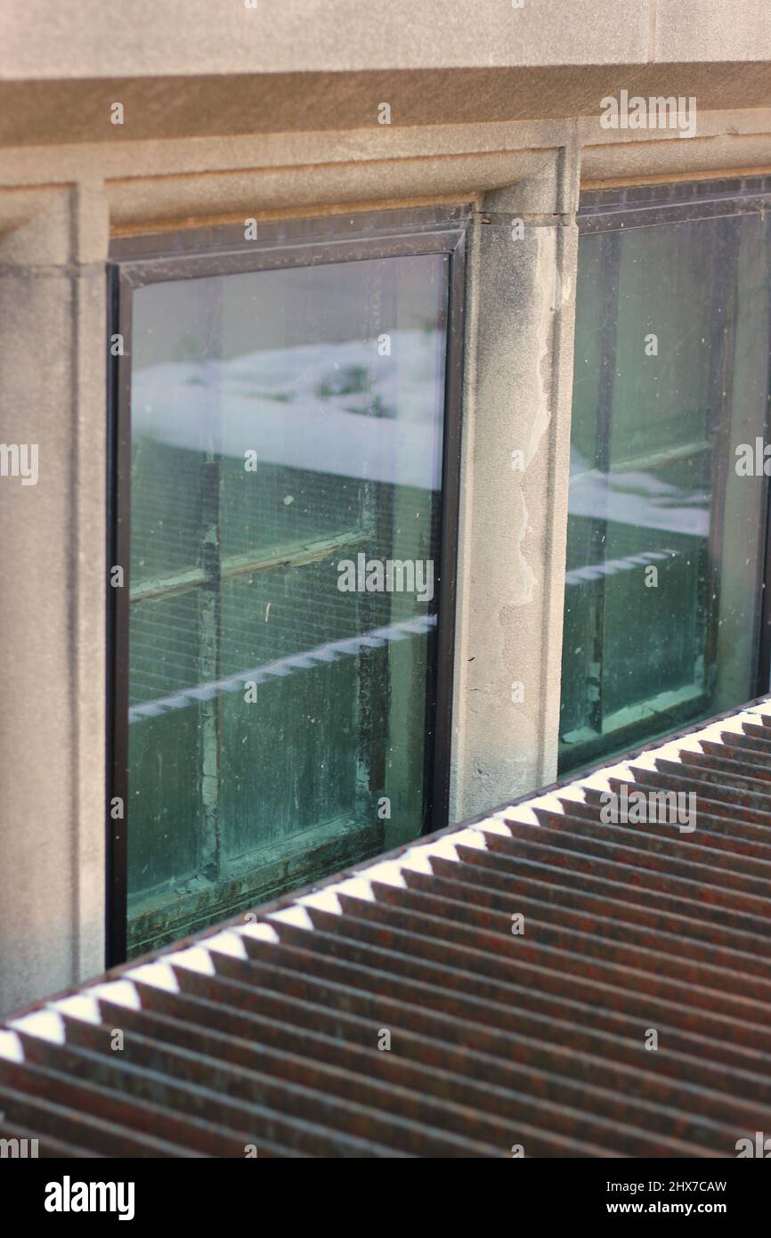 Basement window of an urban residential home Stock Photo - Alamy