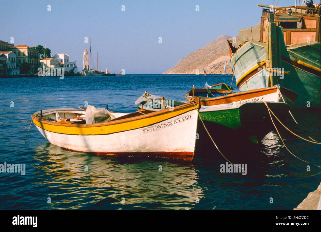 Fishing in Symi Harbour, Crete Stock Photo - Alamy