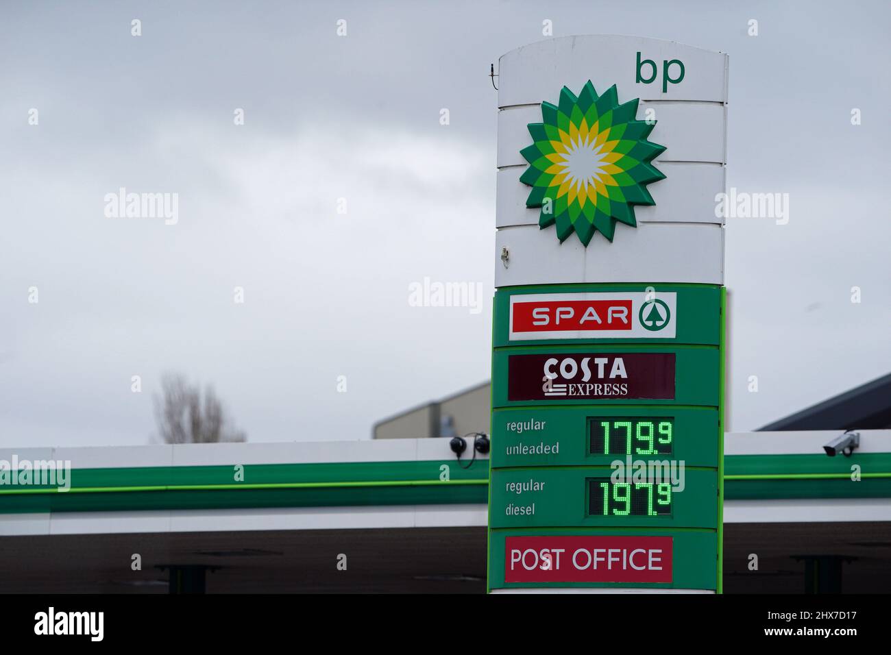 A display sign showing unleaded petrol prices at 179.9 p per litre and ...