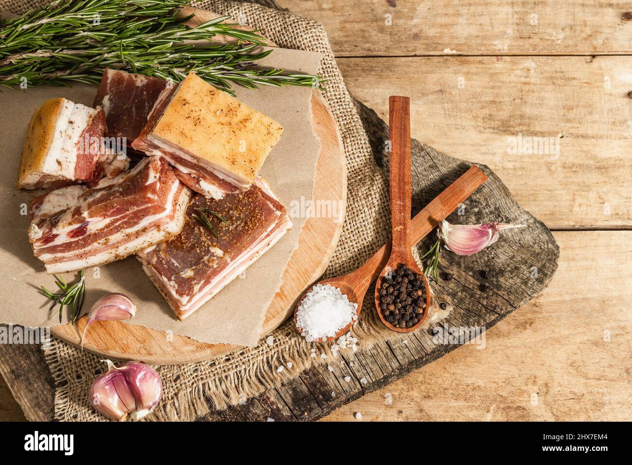 Pieces of salty high-fat meat cooked with spices. Salo, bacon, lard ...
