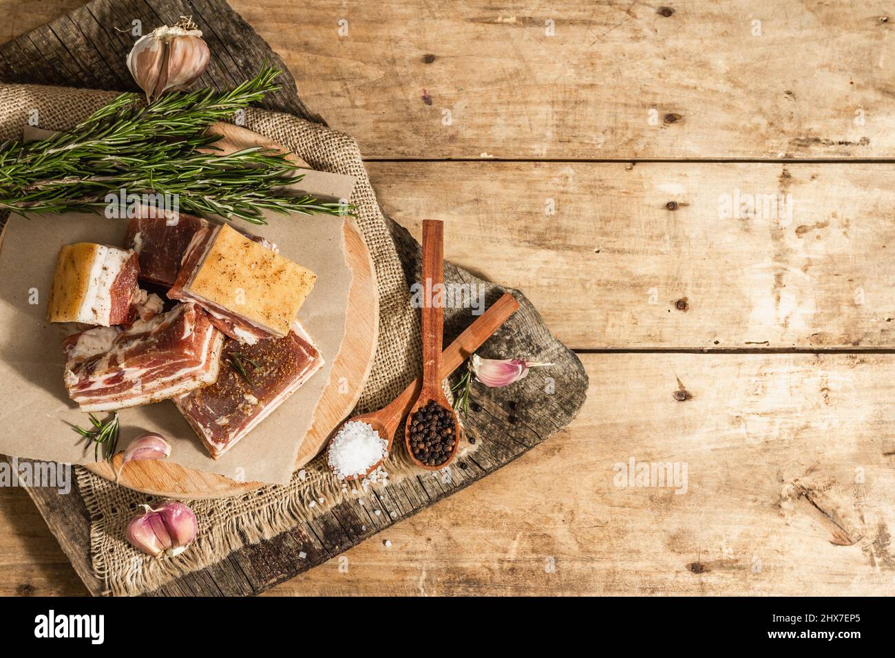 Pieces of salty high-fat meat cooked with spices. Salo, bacon, lard ...