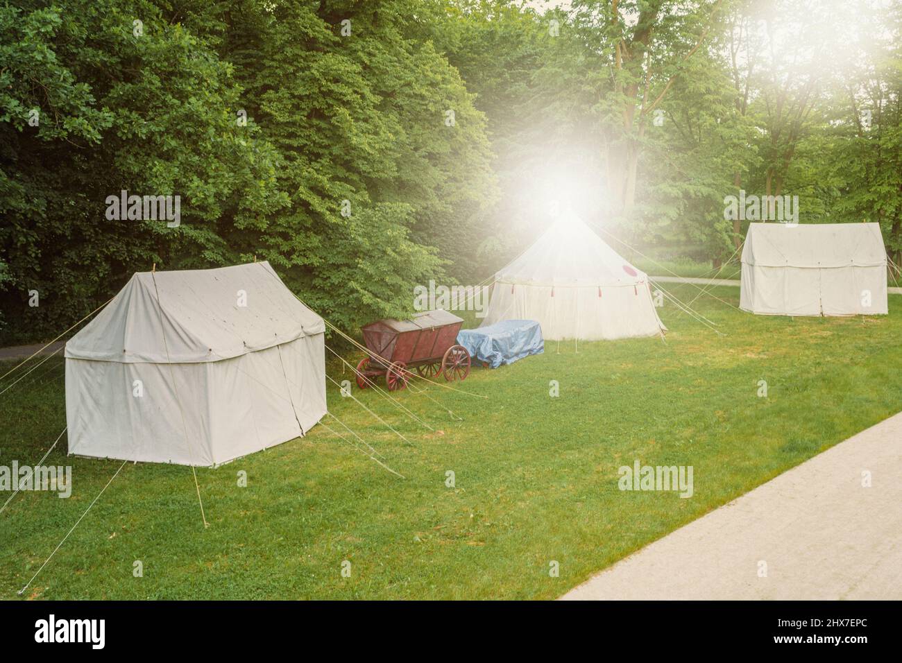 Military medieval camp with tents and weapons. Sunshine. Military tents ...