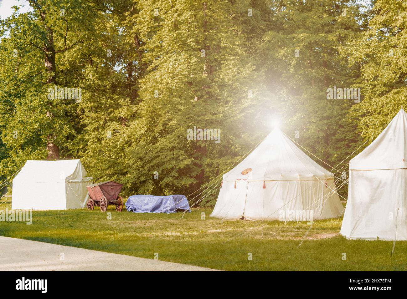 Military medieval camp with tents and weapons. Sunshine. Military tents ...