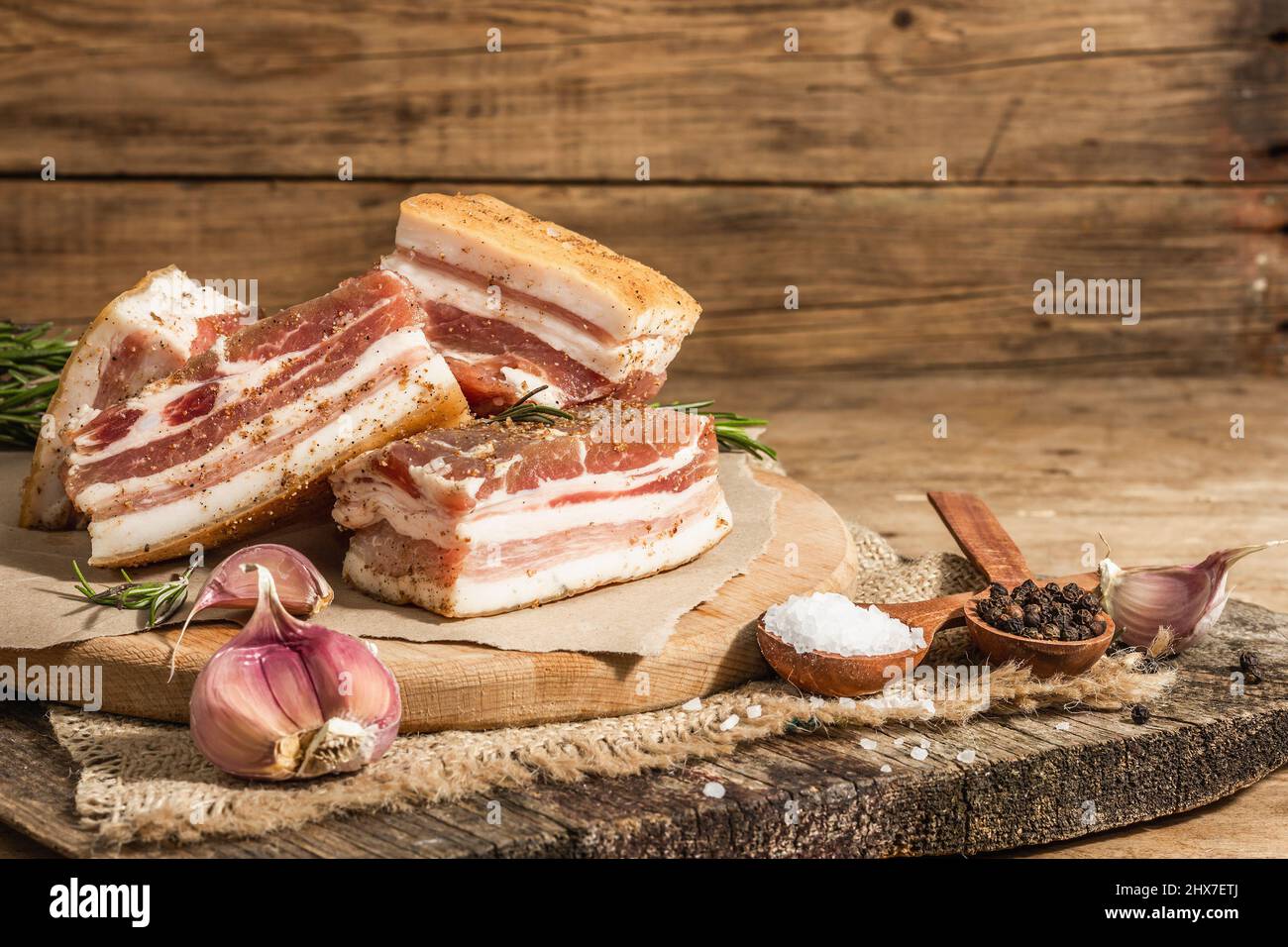 Pieces of salty high-fat meat cooked with spices. Salo, bacon, lard ...