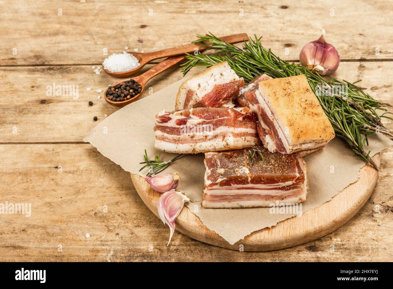 Pieces of salty high-fat meat cooked with spices. Salo, bacon, lard ...