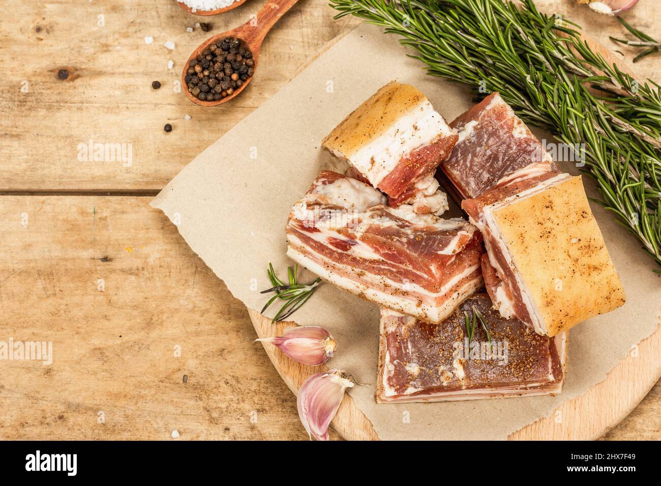 Pieces of salty high-fat meat cooked with spices. Salo, bacon, lard ...