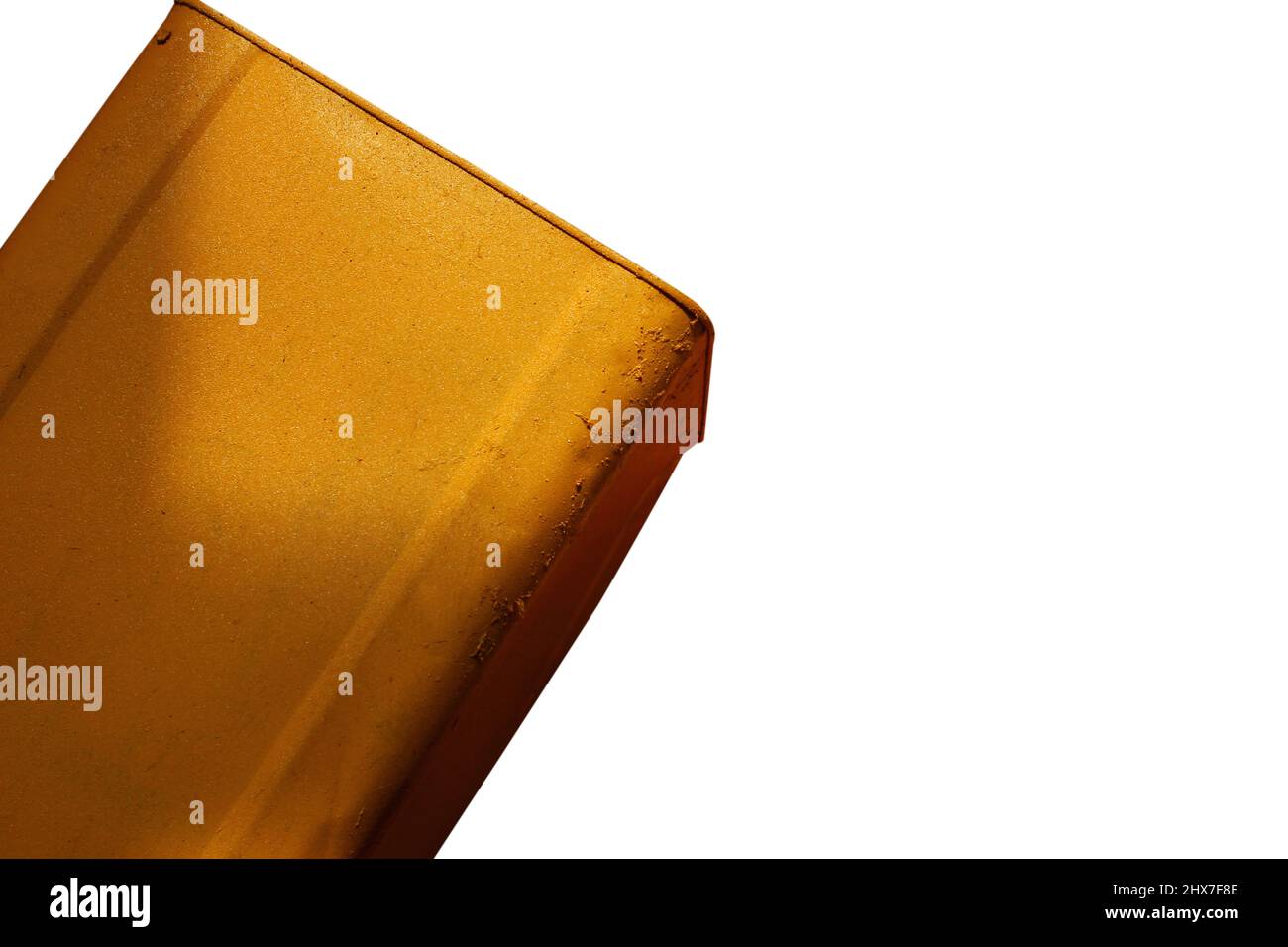 yellow tin on a white background Stock Photo - Alamy