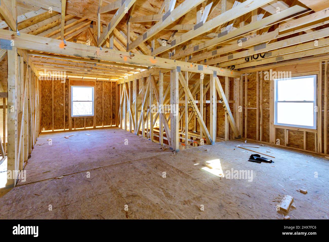 New stick built building view framing of beams on new home under ...