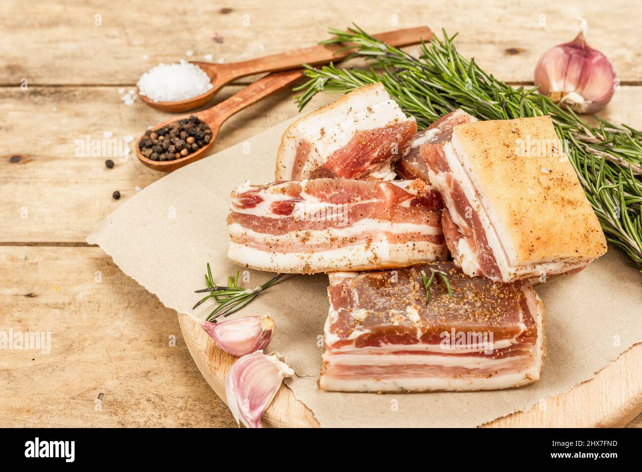 Pieces of salty high-fat meat cooked with spices. Salo, bacon, lard ...