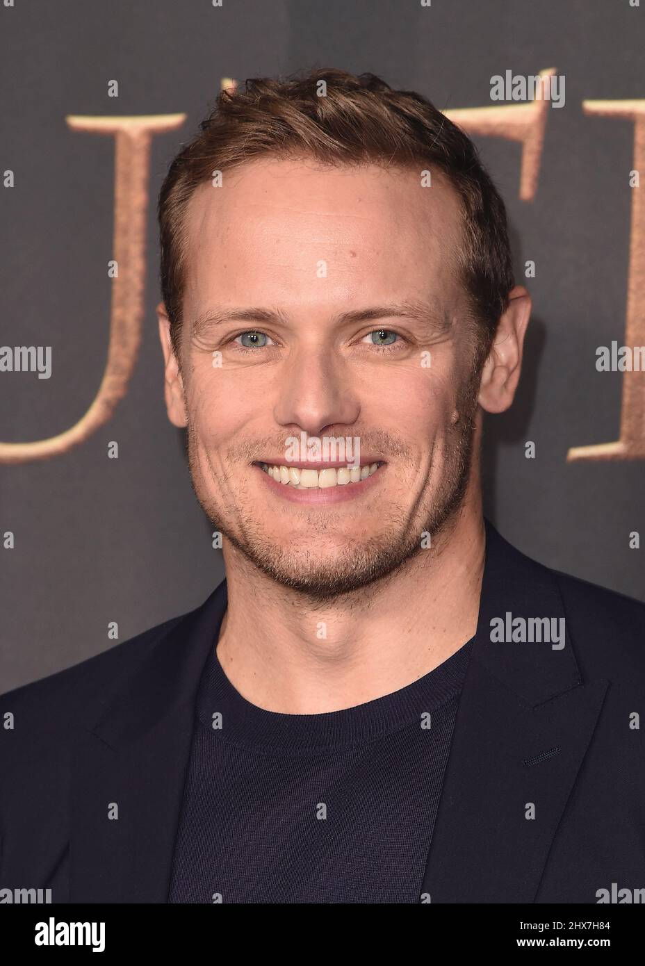 Los Angeles, CA on March 9, 2022. Sam Heughan walking on the red carpet ...