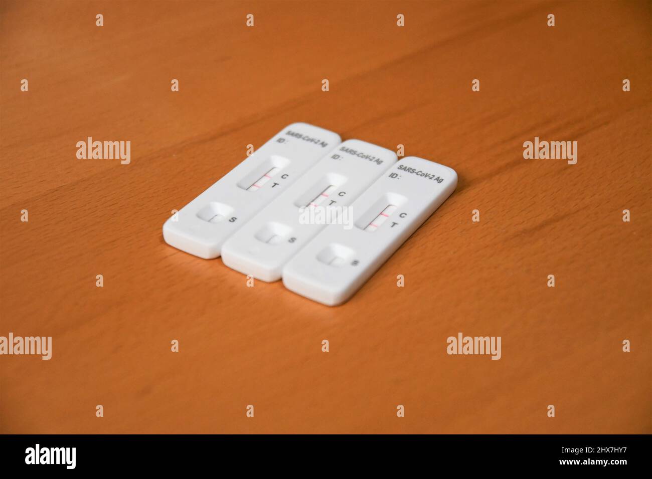 Three positive COVID-19 antigen, lateral flow, self tests. White tests ...