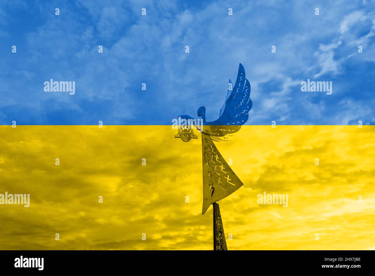 Ukrainian national flag with angel sculpture, war concept Stock Photo ...