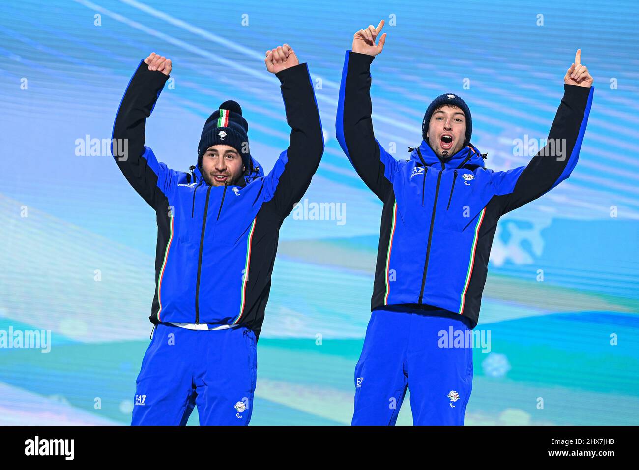 Beijing, China. 10th Mar, 2022. Silver medalist Giacomo Bertagnolli (R ...