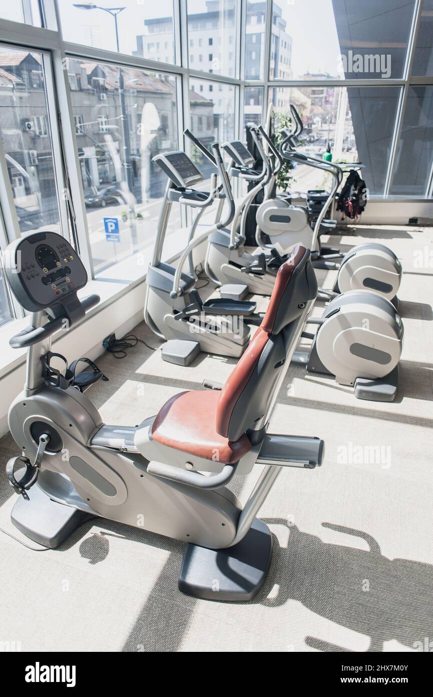 Different fitness training exercise equipment in the modern gym ...