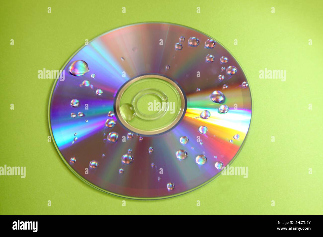 Water drops on a cd Stock Photo - Alamy