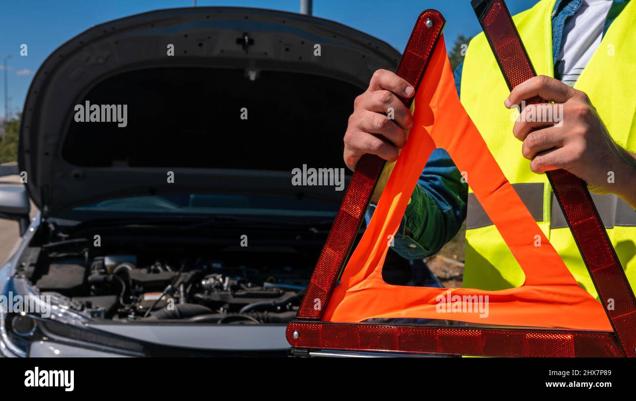 Car standing near stop sign hi-res stock photography and images - Alamy
