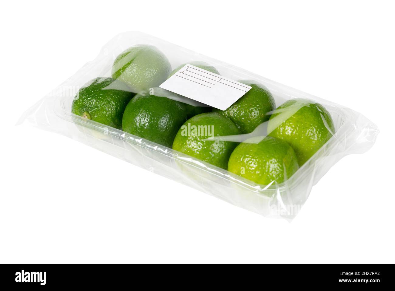 Freshly harvested limes packaged and labeled on an isolated white background Stock Photo - Alamy
