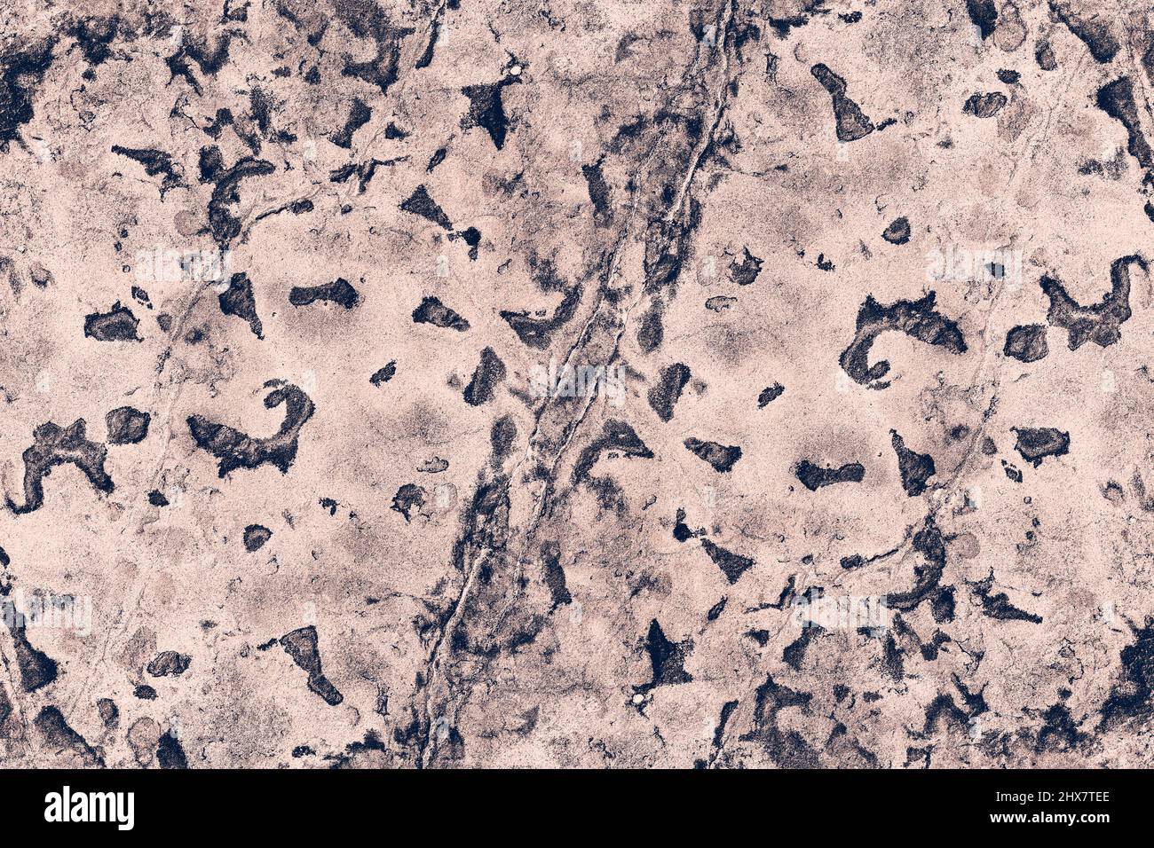 Grungy dark stone wall surface with stain and spots for texture ...