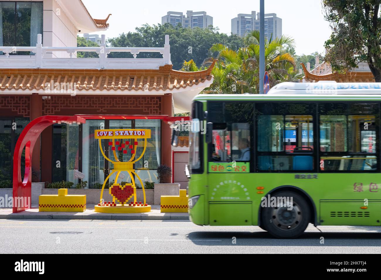 ZHONGSHAN China-March 10;2022:a bus approaching a station named love ...