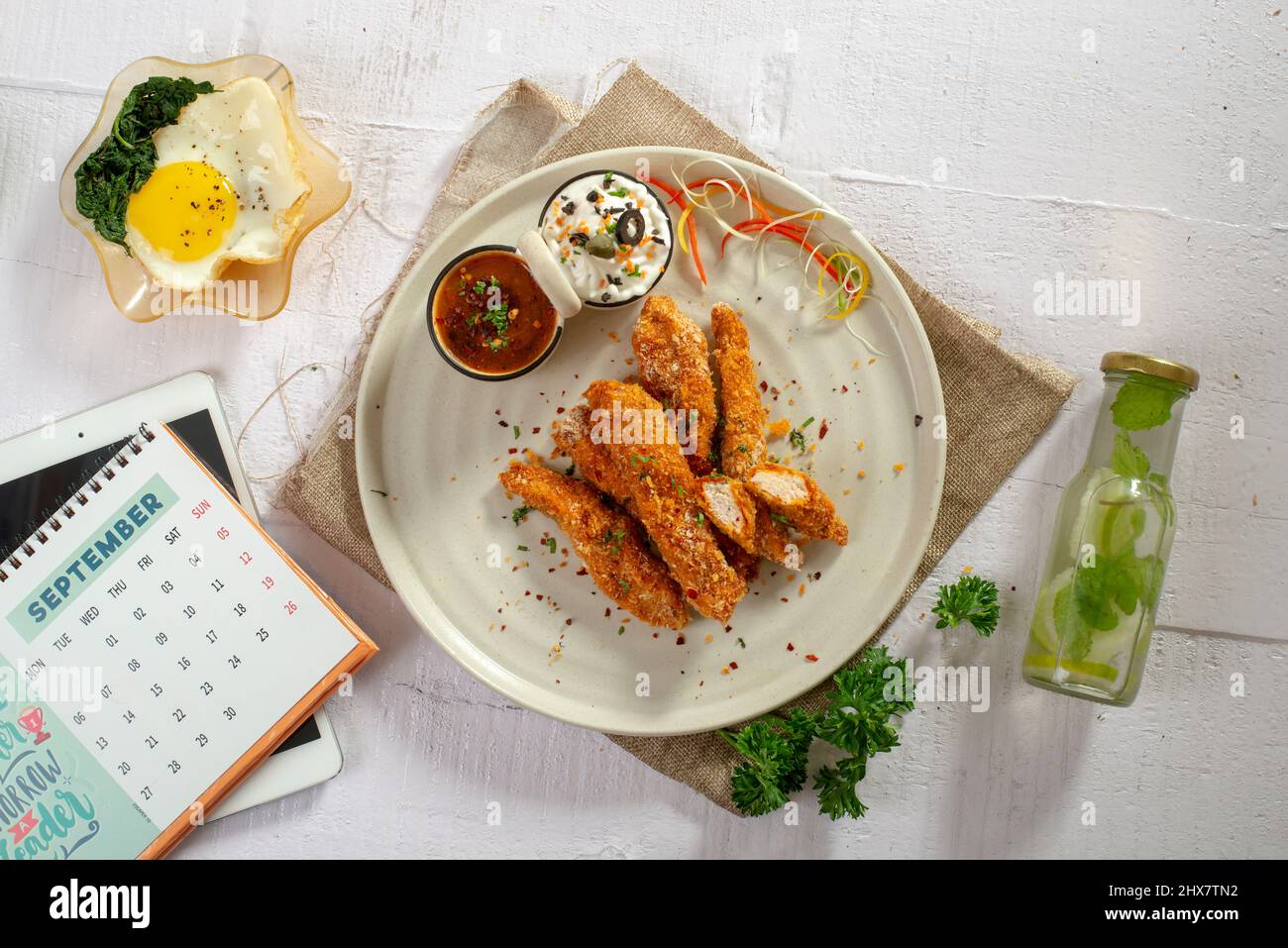 Fried chicken strips with dip Stock Photo - Alamy