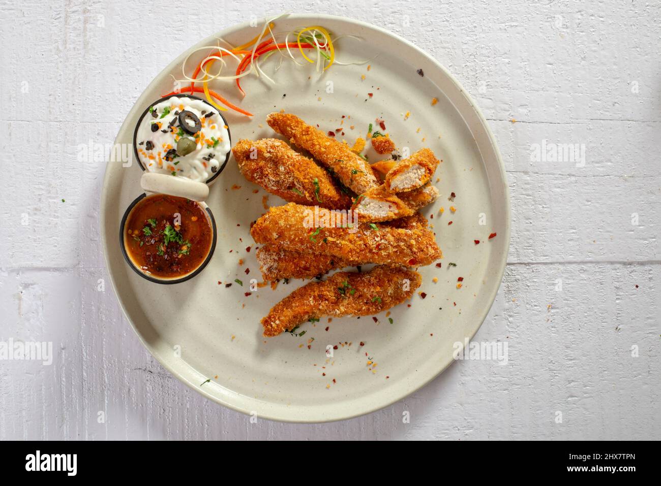Fried chicken strips with dip Stock Photo - Alamy