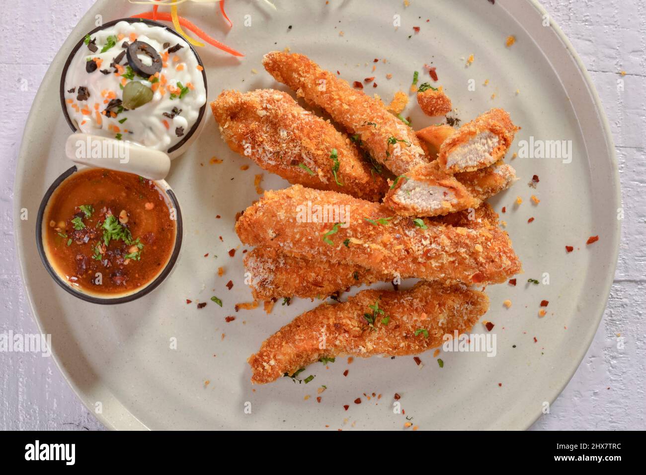 Fried chicken strips with dip Stock Photo - Alamy