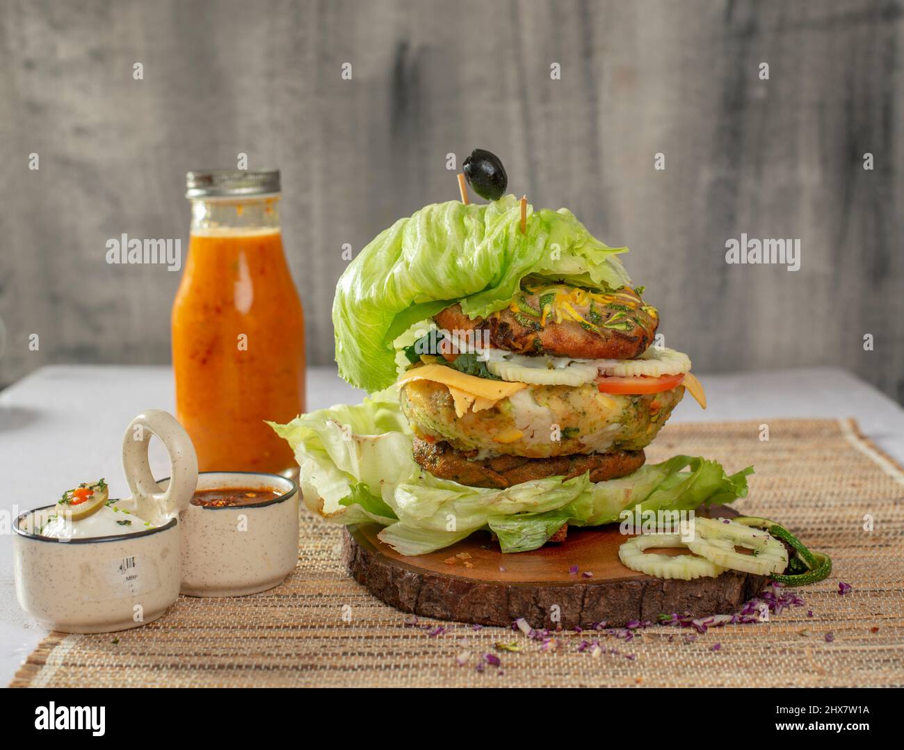 Healthy Burger with fresh juice Stock Photo - Alamy