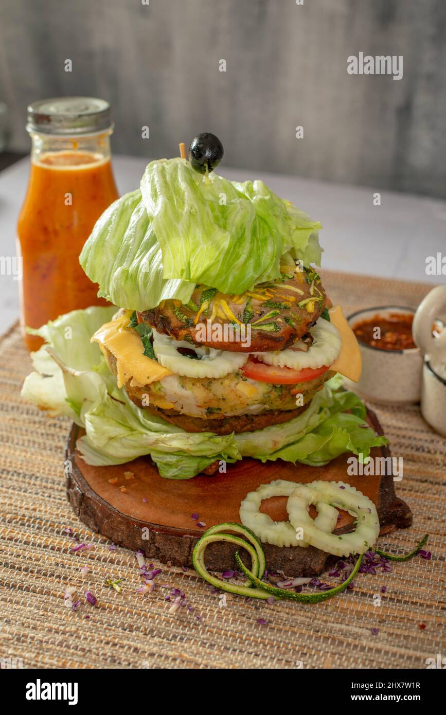 Healthy Burger with fresh juice Stock Photo - Alamy