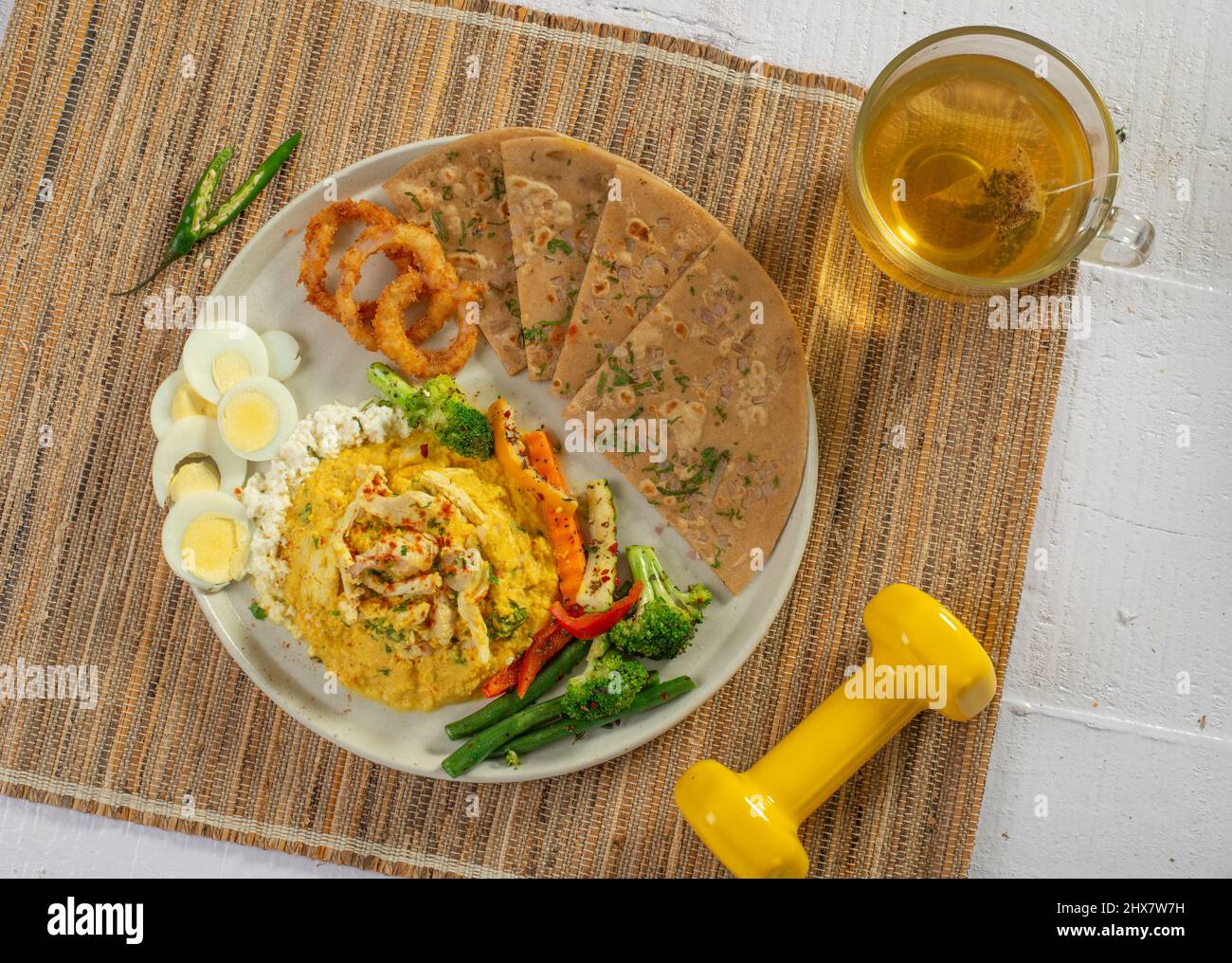 Paratha with Chicken Bharta & Green Tea Stock Photo - Alamy