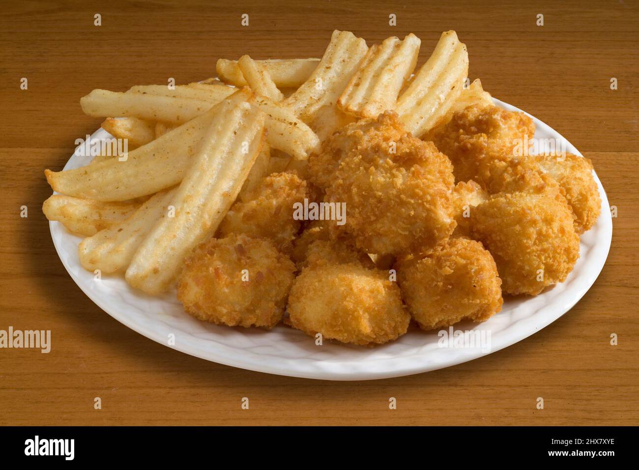 Chicken Poppers and fries Stock Photo - Alamy