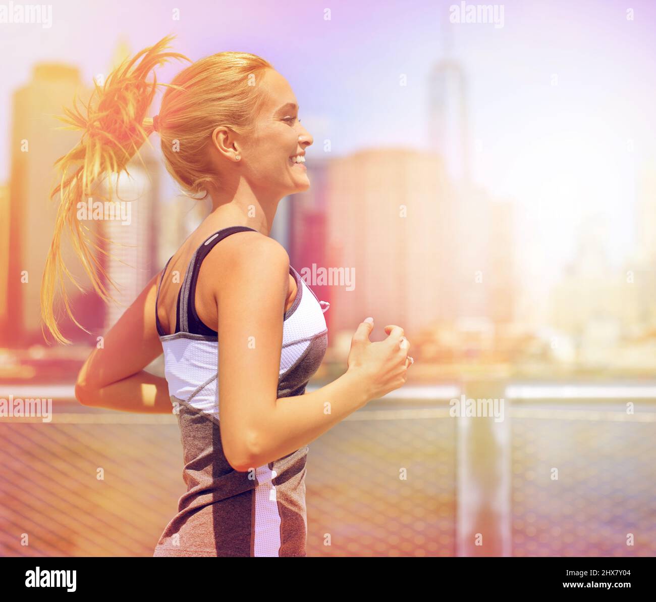 Attractive blonde woman running on hi-res stock photography and images ...