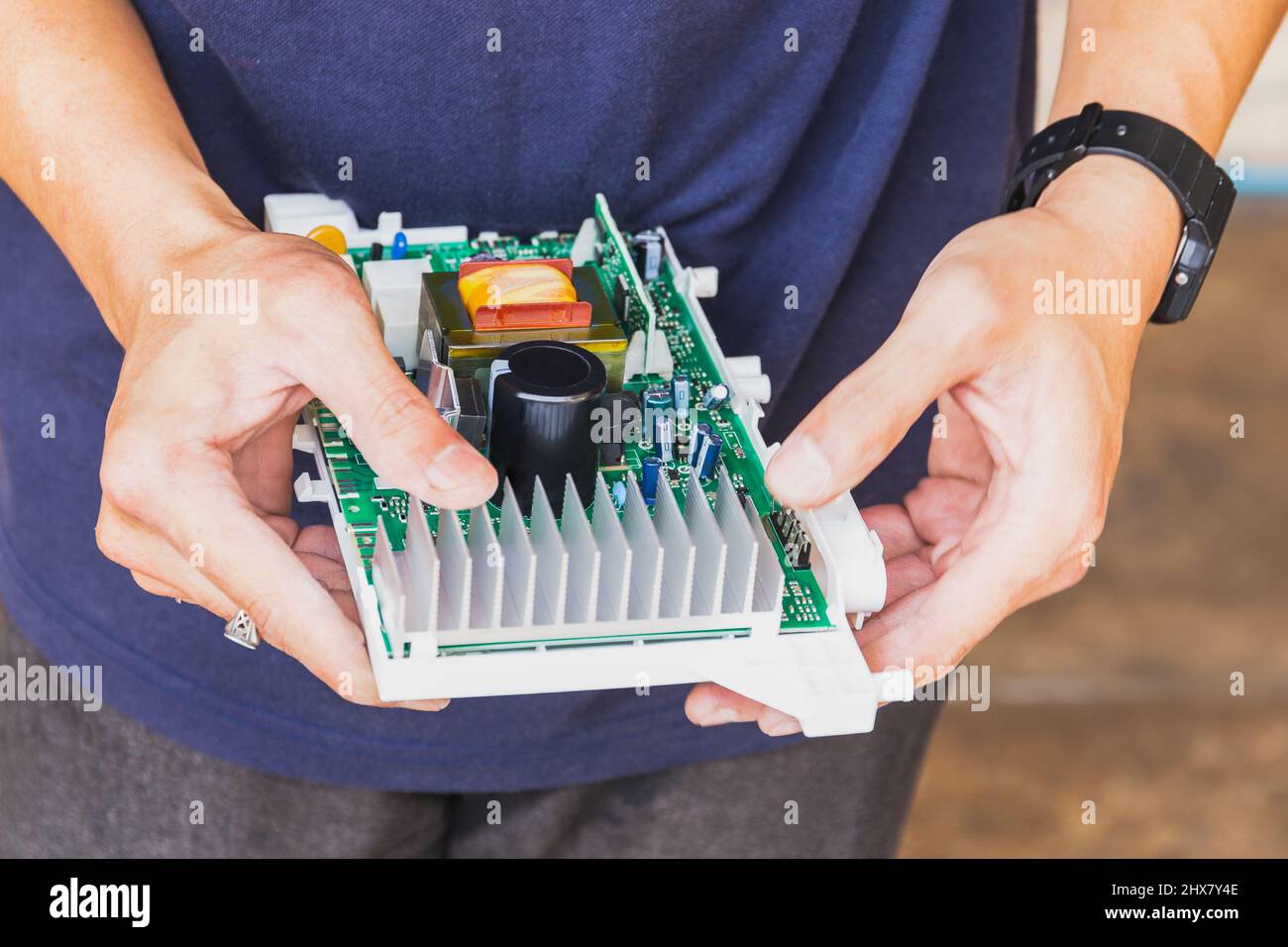Hand holding circuit board hi-res stock photography and images - Alamy