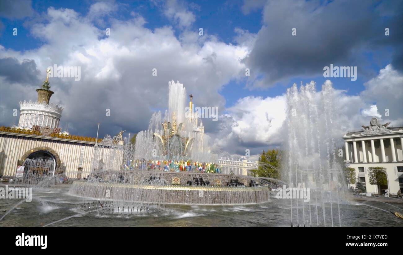Big beautiful fountain on background of old architectural buildings and ...