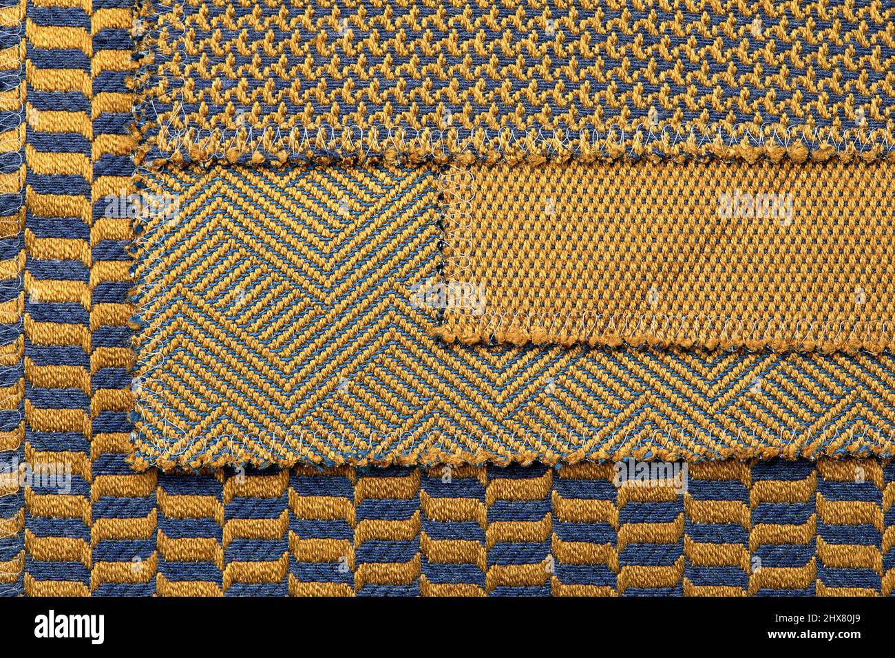 The background consists of several types of old colored tiles with ...
