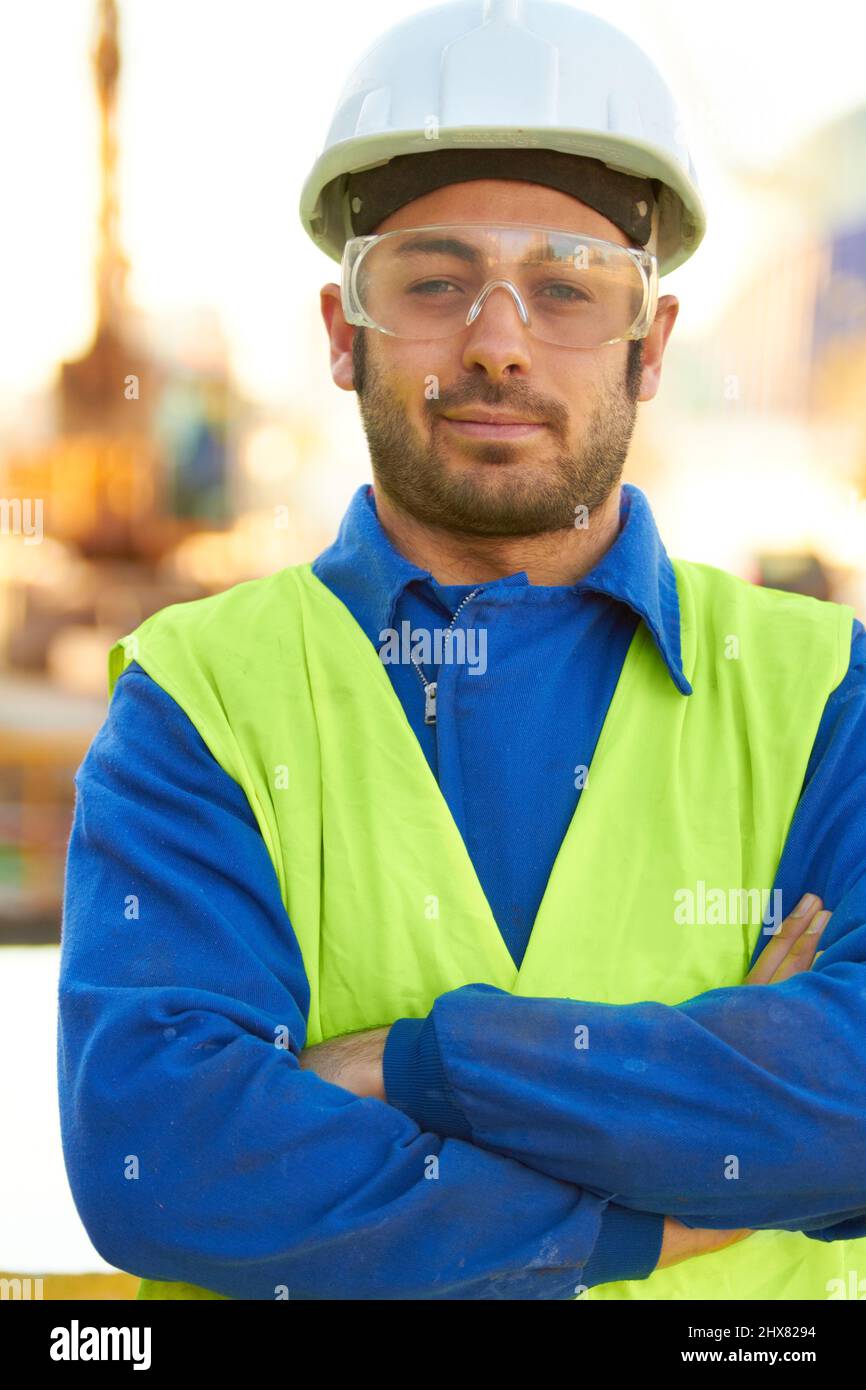 Professional - Hell get the job done. A stern construction working ...