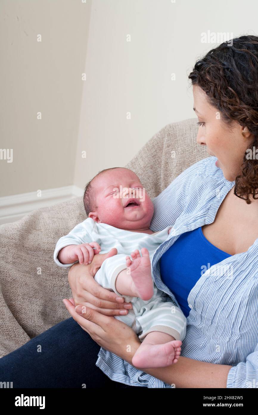 Cradled by arms hi-res stock photography and images - Alamy