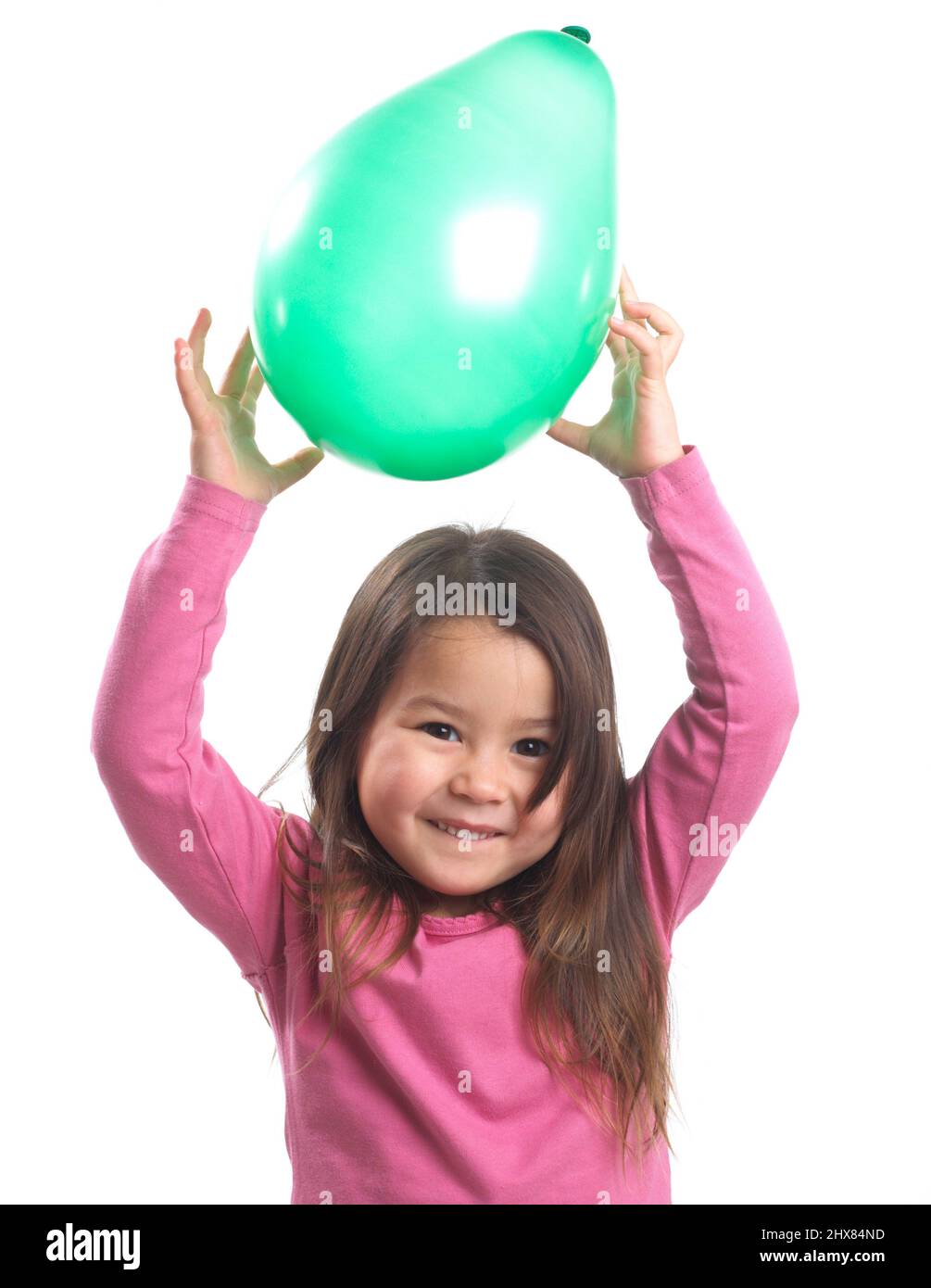 Girl holding balloon, smiling Stock Photo - Alamy