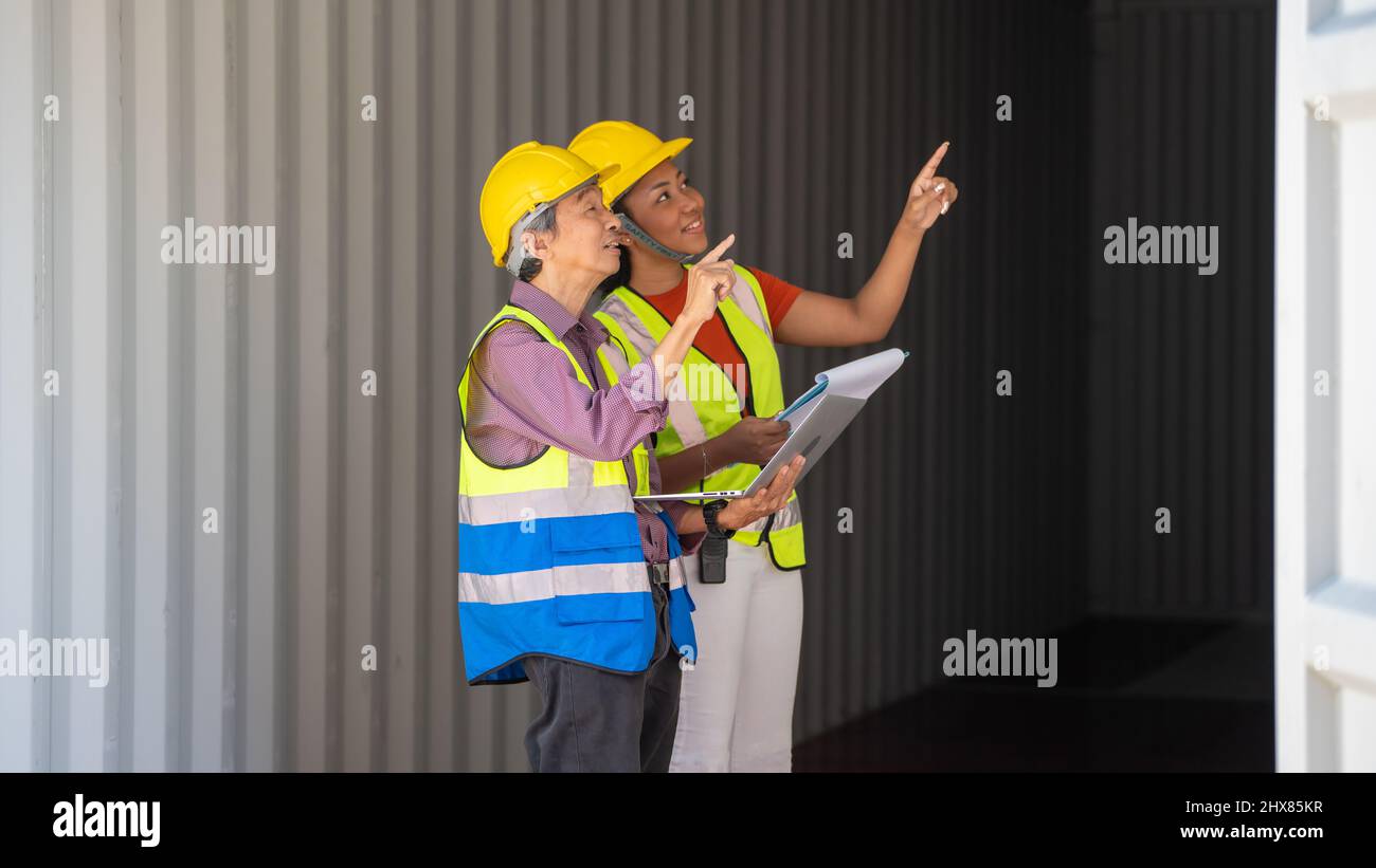 Woman inspector or Safety Supervisor and Old delivery man in Container ...